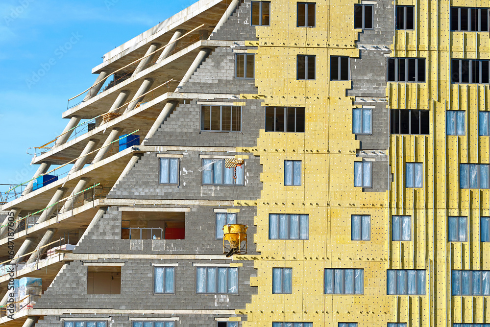 Building construction, windows installing, insulation and cladding ...