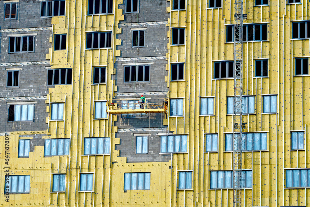 Cladding and warming wall with rock wool. Insulation walls of building ...