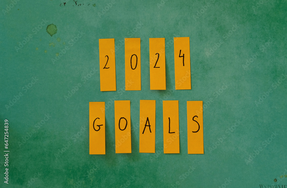 2024 goals. Paper tags with 2024 goals written. Concept photo of ...