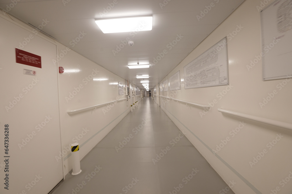 crew area corridors and hallways on a cruise ship with emergency exit ...