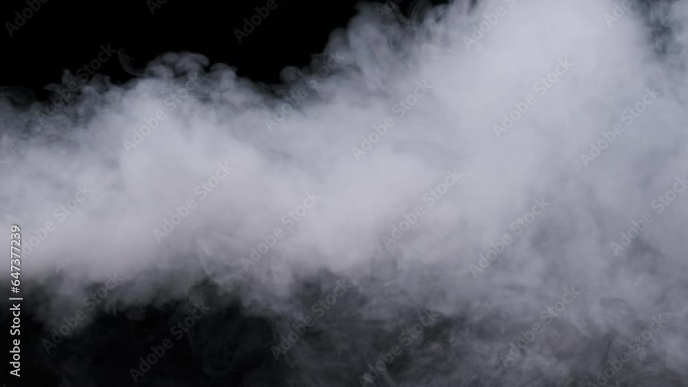 Jet stream of smoke or vapor on black background in slow motion 4K ...