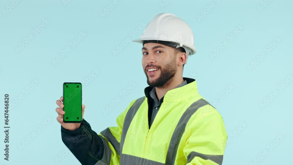 Construction man, green screen phone and studio with pointing, app ...