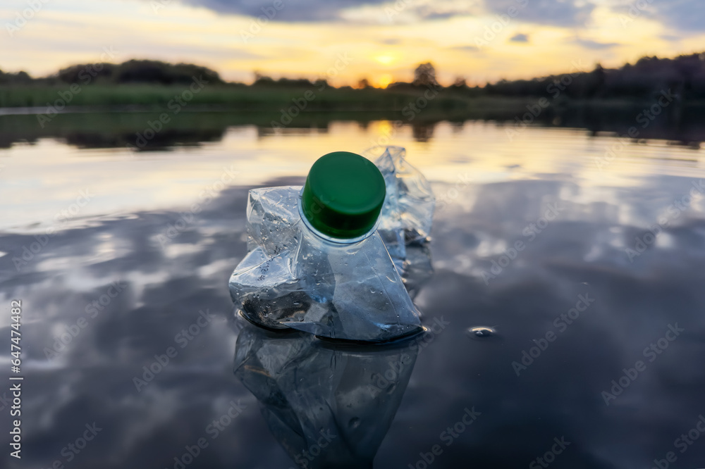 Marine plastic pollution. Plastic waste in lake water. Wastewater ...