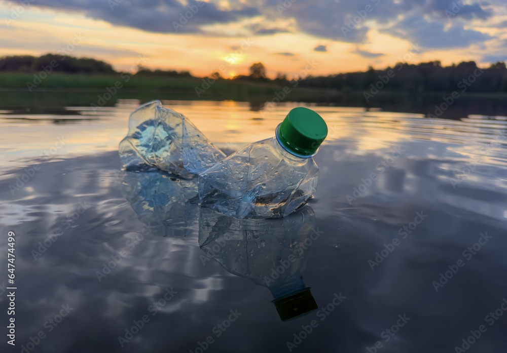 Marine plastic pollution. Plastic waste in lake water. Wastewater ...