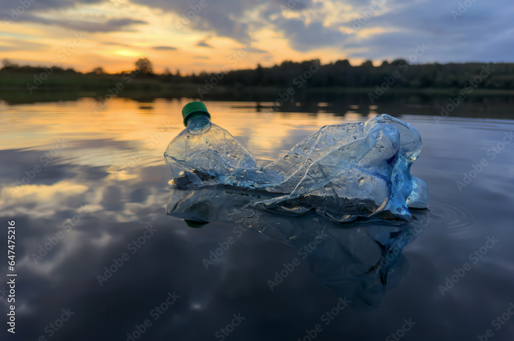 Marine plastic pollution. Plastic waste in lake water. Wastewater ...