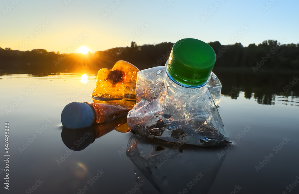 Marine plastic pollution. Plastic waste in lake water. Wastewater ...