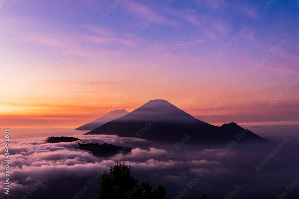 The beautiful view of the sunrise with Mount Sindoro, Mount Sumbing ...