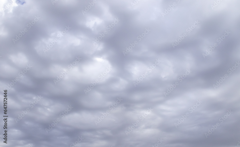 Overcast sky with dark clouds. Dark sky before a thunder-storm. The ...