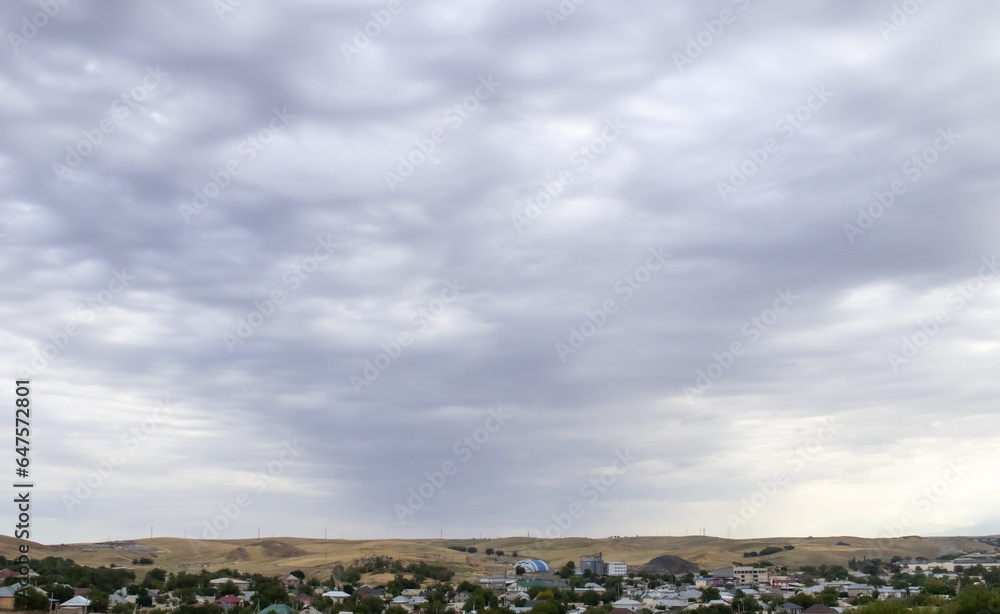 Overcast sky with dark clouds. Dark sky before a thunder-storm. The ...