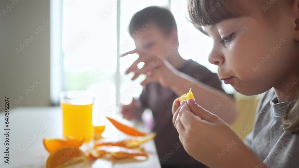 children eat oranges. happy family a kid dream concept. drinking fresh ...