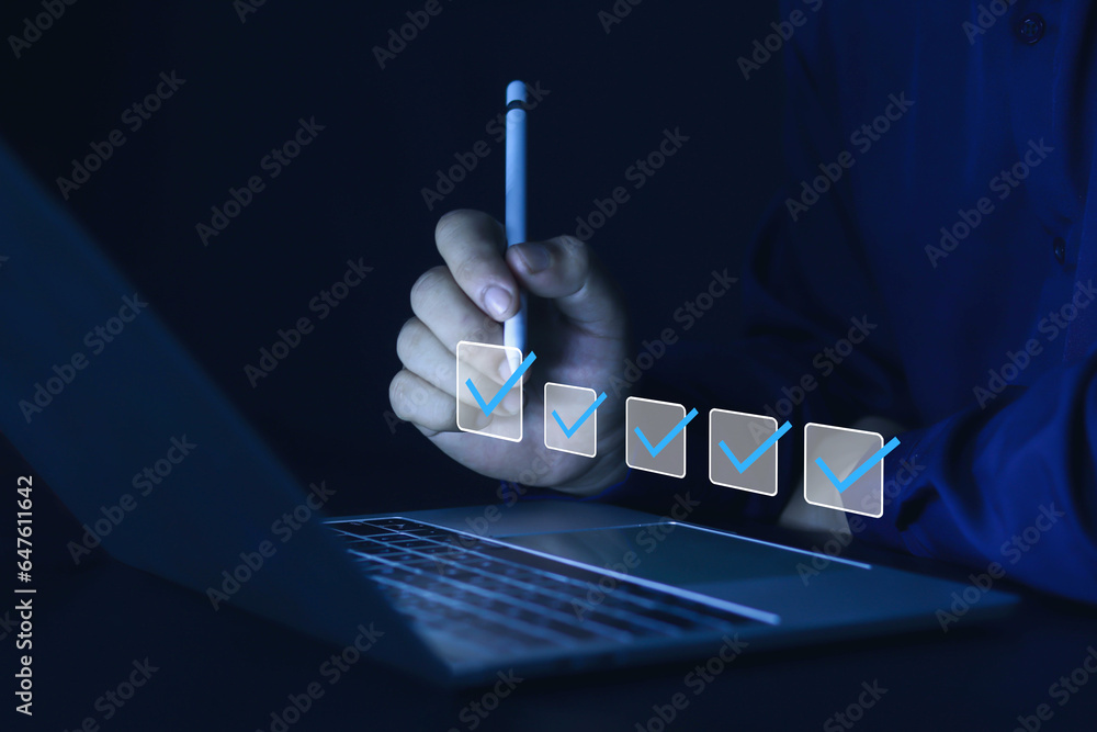 Businessman showing check mark summarizing job Compile lists, votes ...