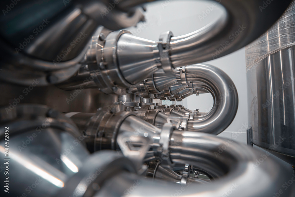 Industrial pipeline elbow system. Large, thick exchanger stainless ...