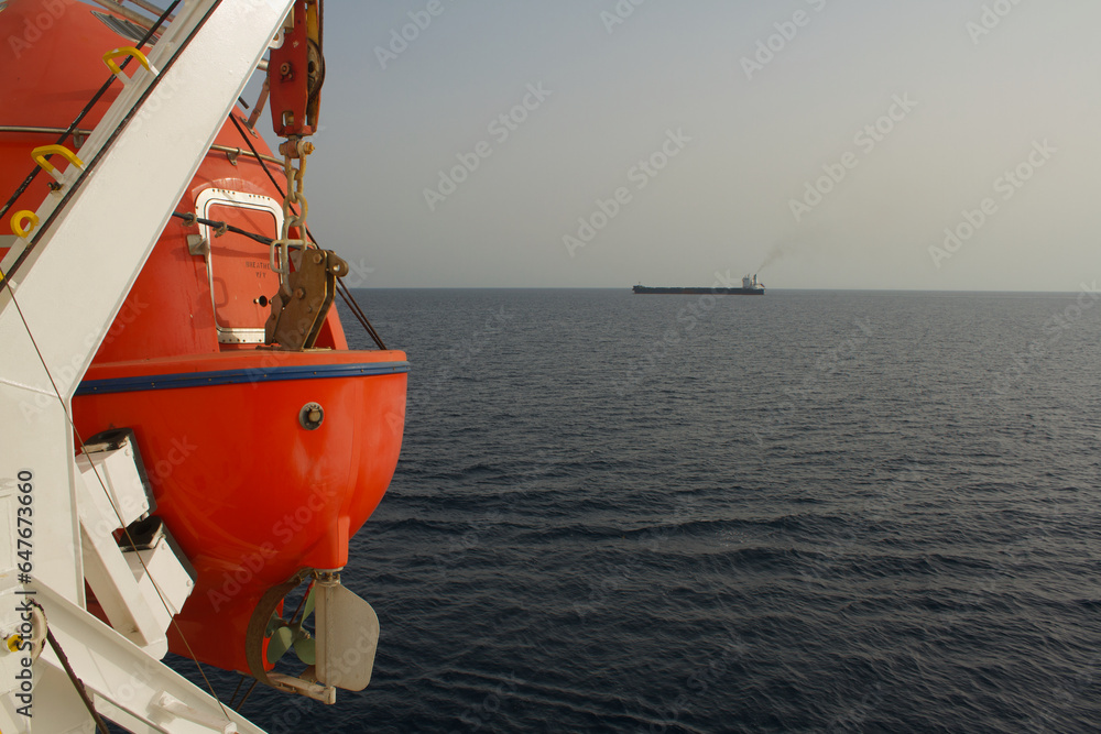 Propeller and rudder of a life boat secured onboard a merchant ship at ...