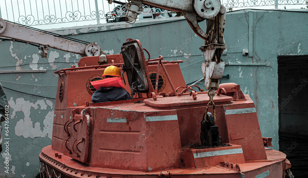 davit launched liferaft onshore, old rusty ship lifeboat, resque ...