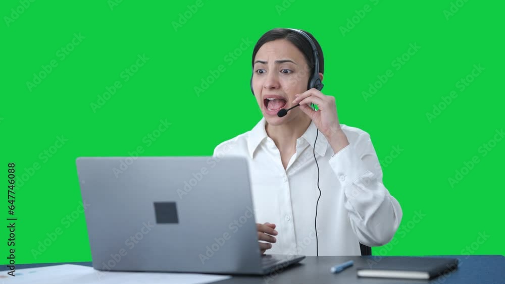 Angry Indian call center girl talking to customer through call Green ...