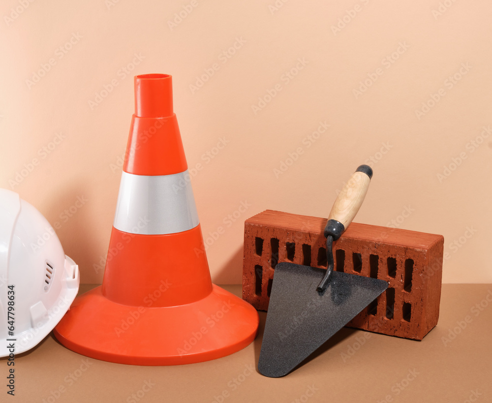 Building construction engineering tools on a beige background ...