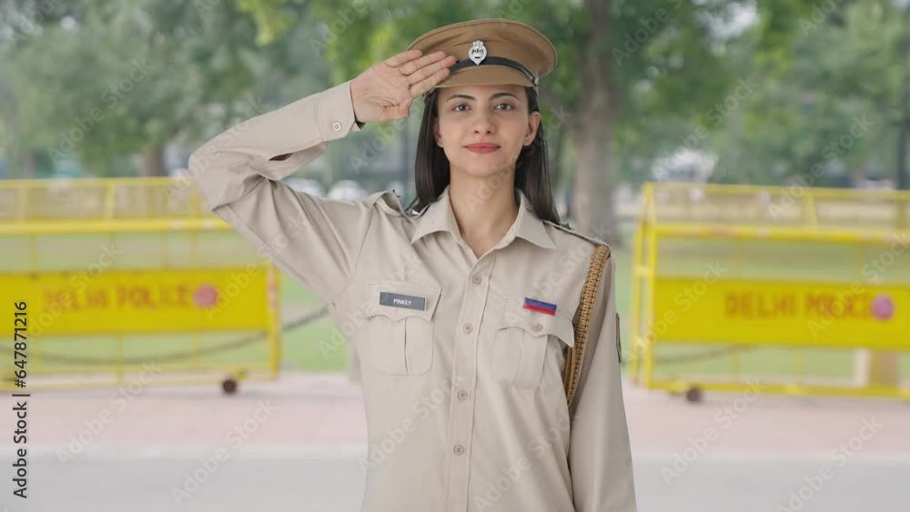 Proud Indian female police officer saluting Stock Video | Adobe Stock