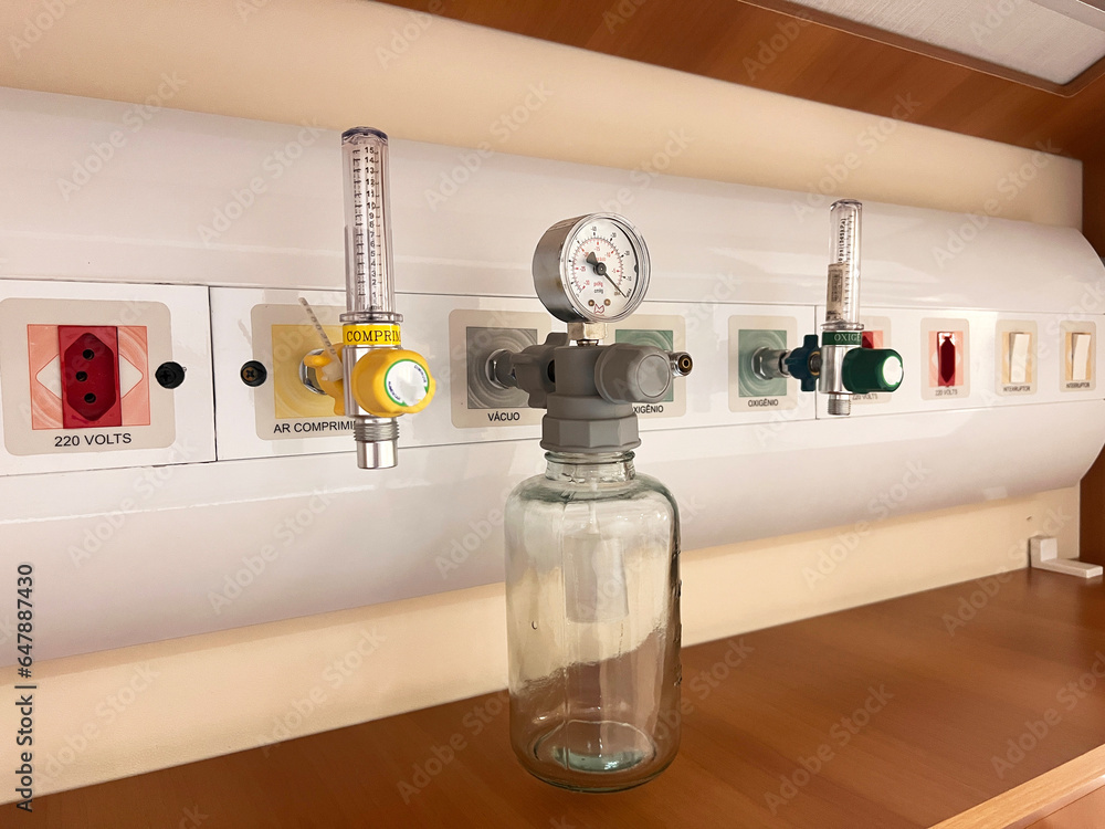Hospital gases in the patient room wall. Oxygen and compressed air ...