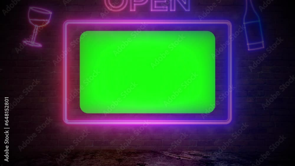 4K Monitor with green screen on dark brick wall and neon backlight ...