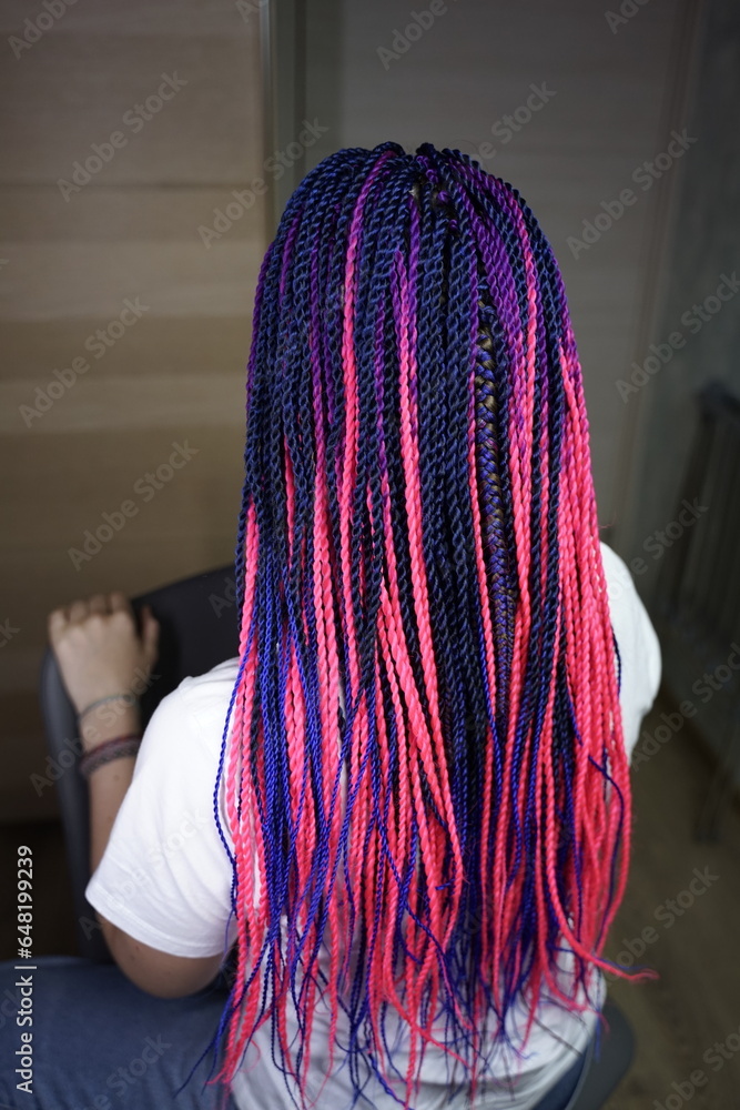 African braid with Kanekalon on a model, afro-locks on a frame, frame ...