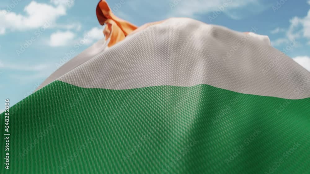 Wavy flag of Ireland blowing in the wind in slow motion. Waving ...