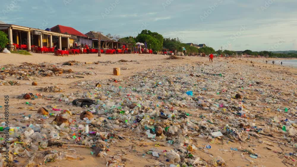 Bali Beach littered plastic waste. Indonesia is one of the world ...