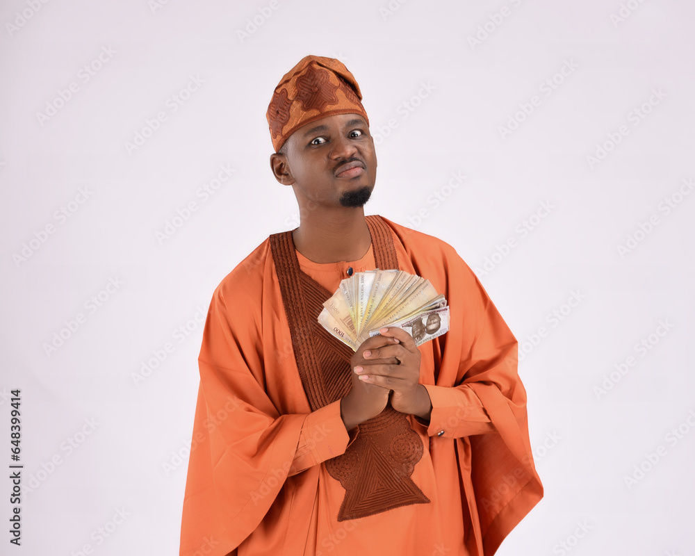 angry stingy upset rich African man wearing Yoruba Nigerian native ...