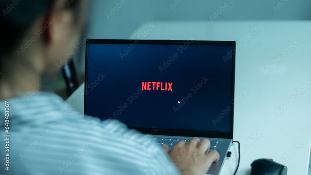 LAMPHUN, THAILAND - September 15, 2023: Woman using a laptop and ...