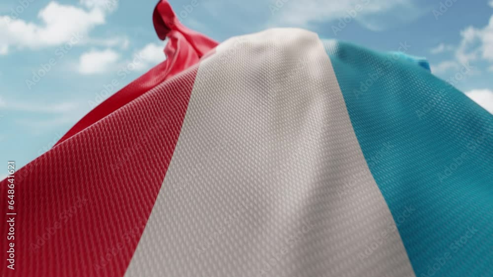 Wavy flag of Luxembourg blowing in the wind in slow motion. Waving official Luxembourg flag team ...