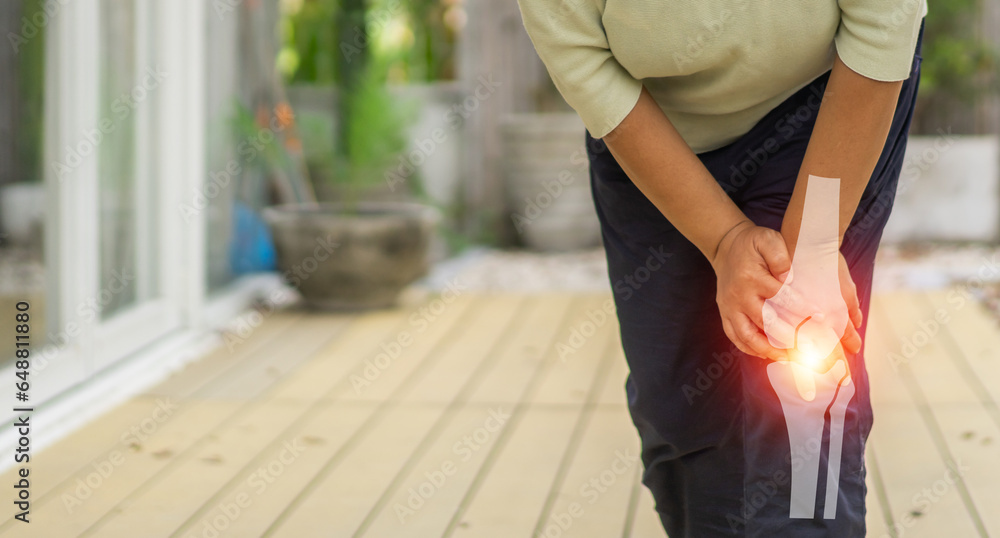 Sick unhappy senior adult elderly asian woman touching her muscle ...