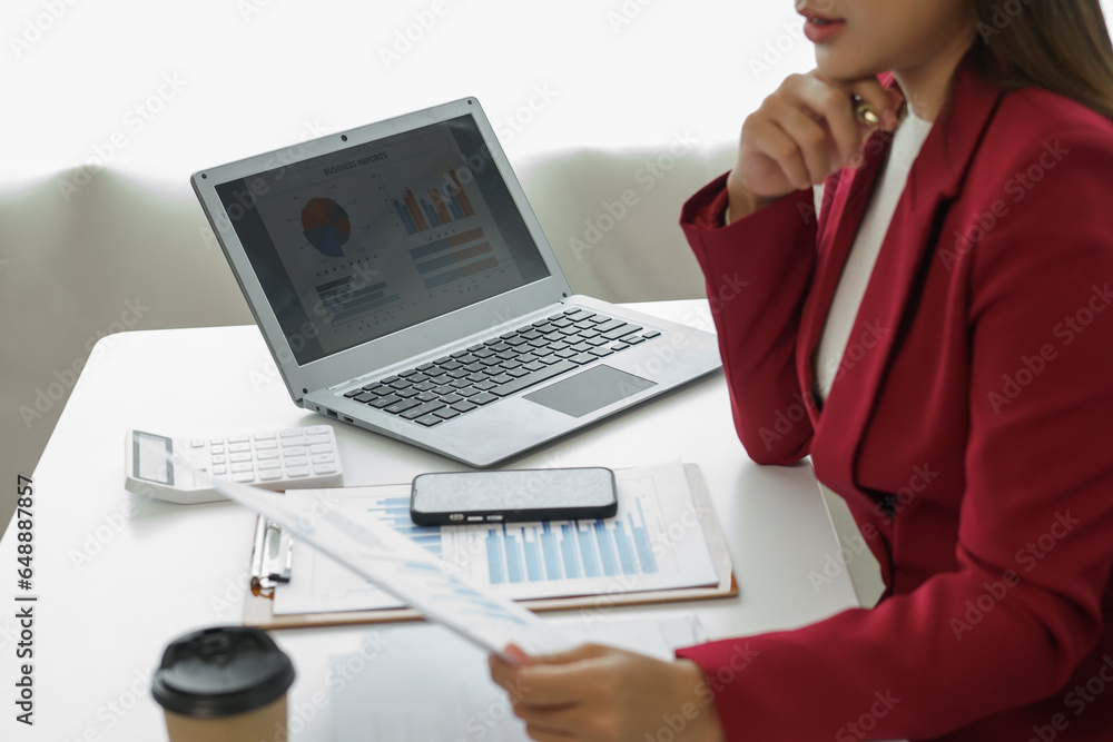 Image of a female manager working using a desktop computer Operations ...