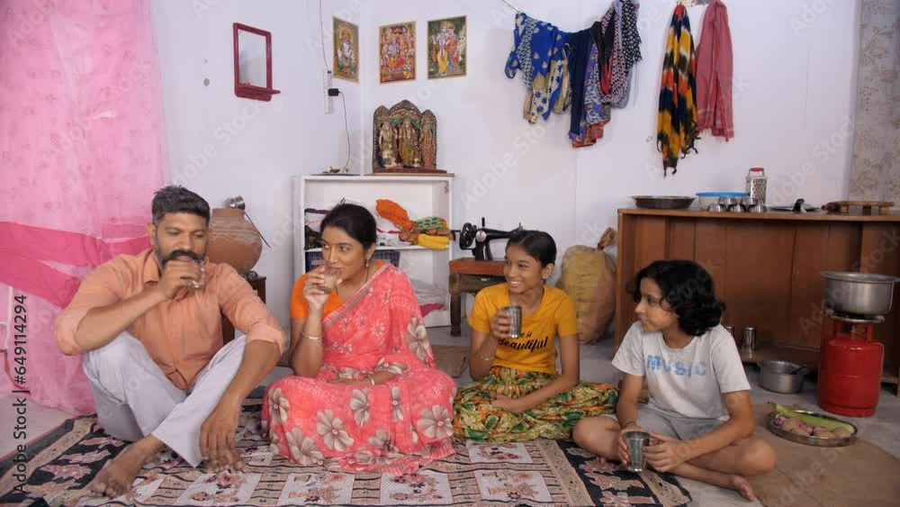 Indian family is sitting and sipping tea - village family happy family ...