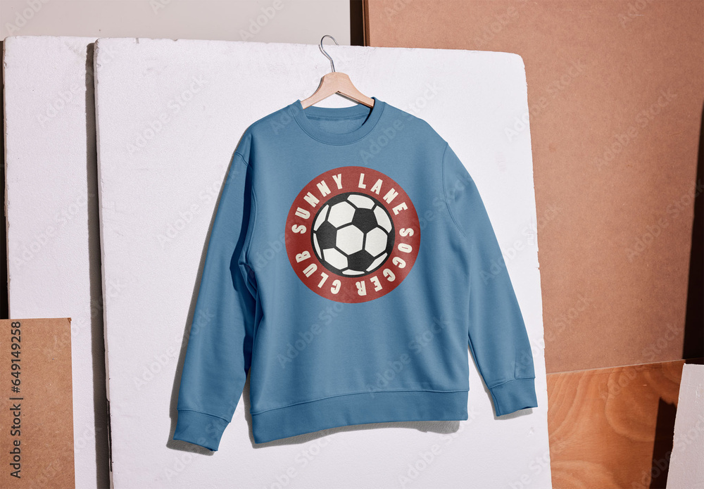 Mockup of customizable color sweatshirt on coat hanger, hard light ...