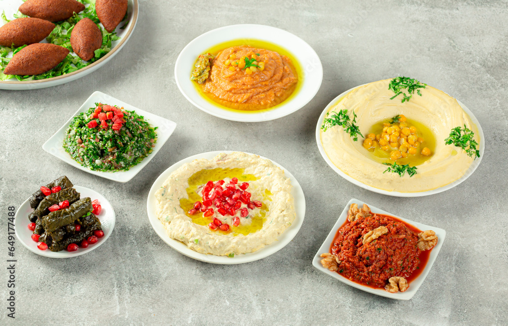 Arab middle eastern traditional meal of hummus, ground beans, salad ...