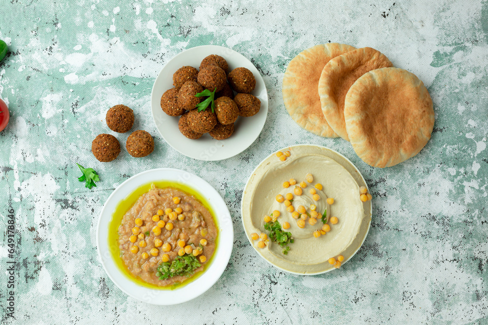 Arab middle eastern traditional breakfast of mashed beans with olive ...