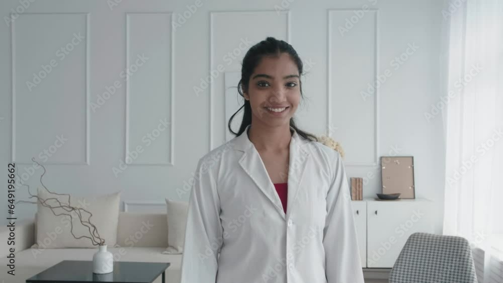 Beautiful Indian intern medical student female in white uniform ...