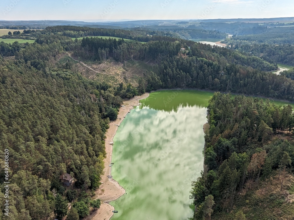 The Hracholusky dam with water power plant. The water reservoir on the ...