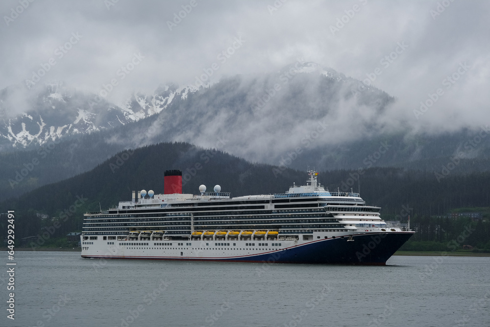 Modern Carnival cruiseship cruise ship liner arrival into foggy and ...