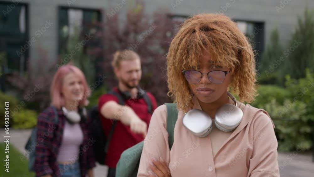 Group of multiracial students friends classmates bully African American ...