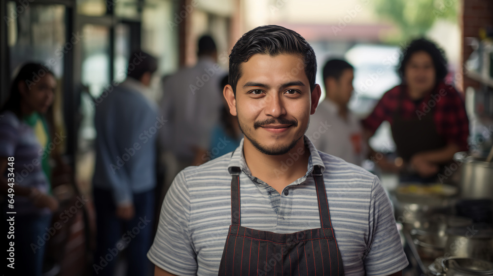 a young Mexican man showcases his culinary skills while cooking ...