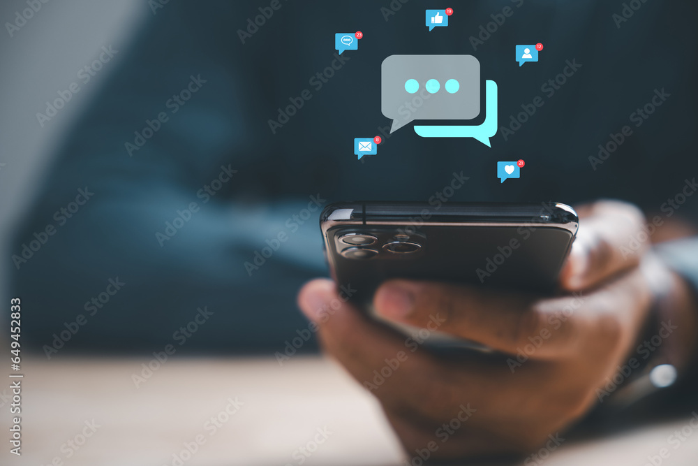 Modern communication at home man chats on smartphone, discussing live ...