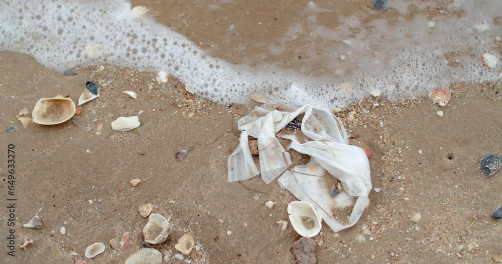 Plastic waste on the sandy beach Cha-am.Marine sea ecosystem full of ...