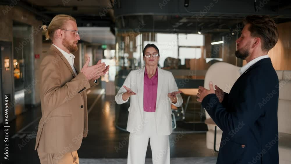 Breathing techniques in a team of office workers. A girl in a white ...