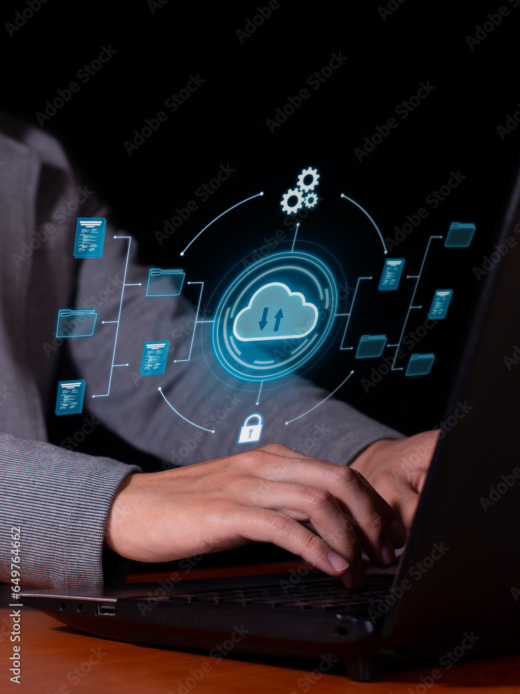 Vertical photo of a Man uses cloud computing on his computer to ...