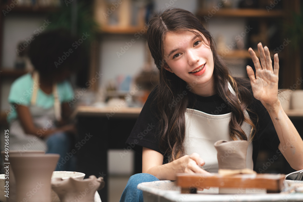 happy smiling girl having fun to learning and work with craft art of ...