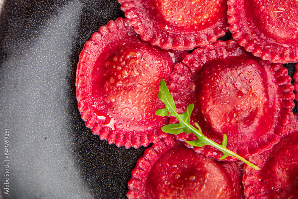 beetroot ravioli beet red pasta in the plate ready to eat appetizer ...