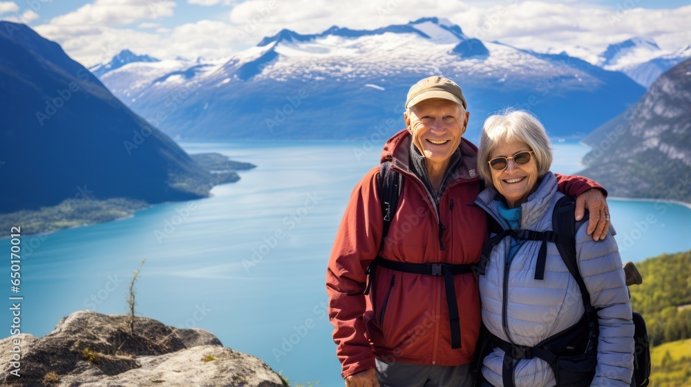 European senior tourist couple, savoring nature against a backdrop of ...