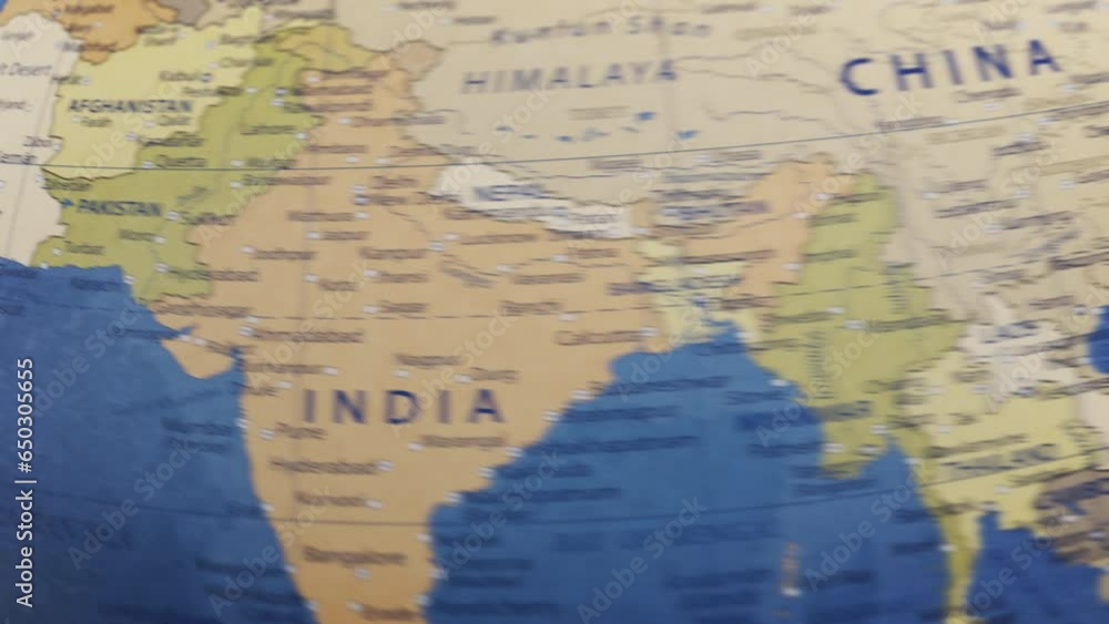 Atlas map of the world globe spinning zooming in and focusing on the ...