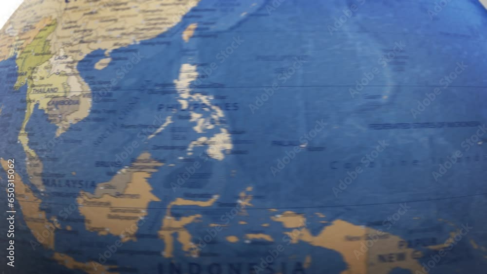 Atlas map of the world globe spinning zooming in and focusing on the ...