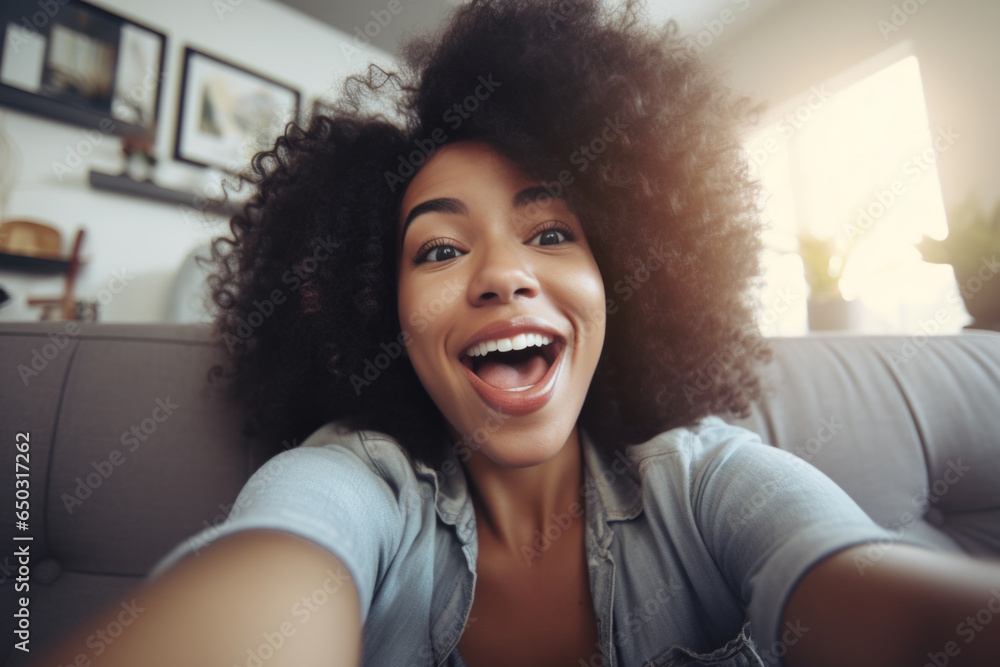Young African American Woman Taking A Selfie Photo At Home To Post On